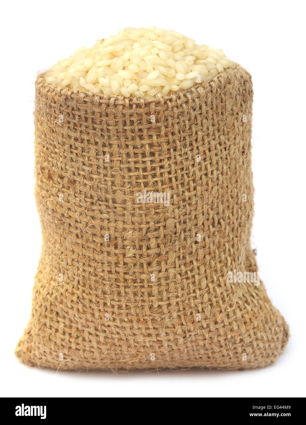 Fresh rice in sack bag over white background Stock Photo - Alamy