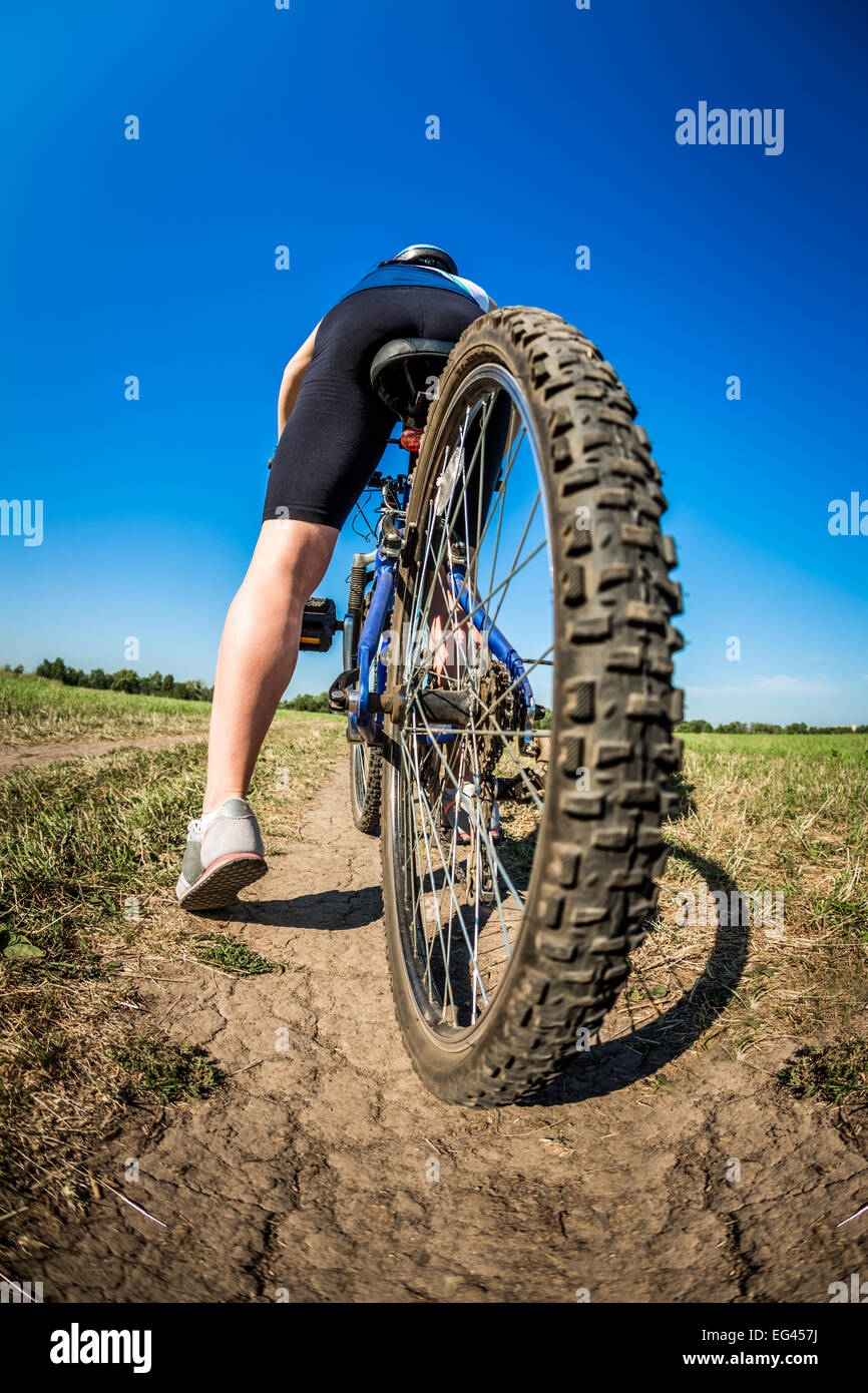 Women riding a bike hi-res stock photography and images - Alamy