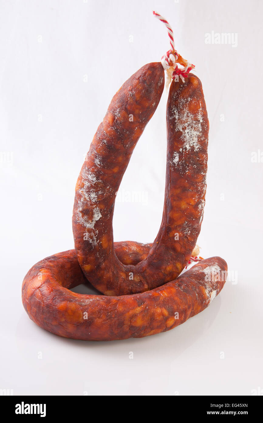 Two red spanish chorizos. Isolated over white background Stock Photo ...