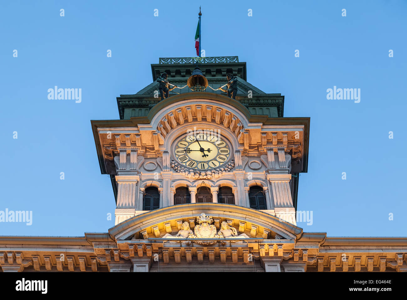 Tower of the Town Hall of Trieste with bronze statue Stock Photo - Alamy