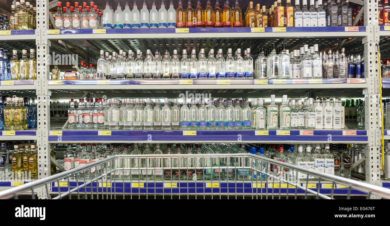 Showcase alcoholic beverages at the hypermarket METRO Stock Photo - Alamy