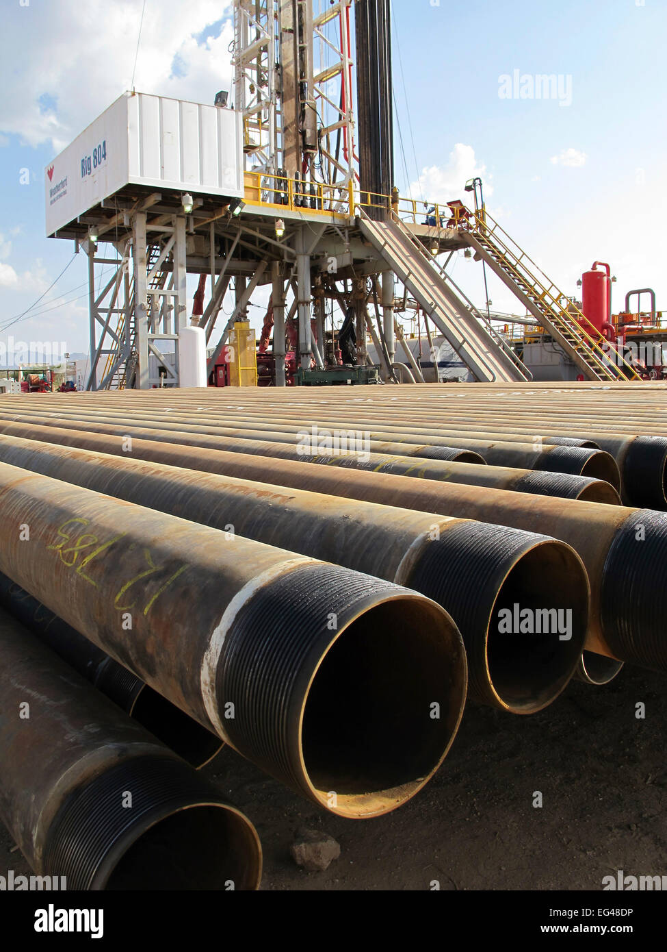 A land drilling rig casing prepared ready to be run in to line the ...