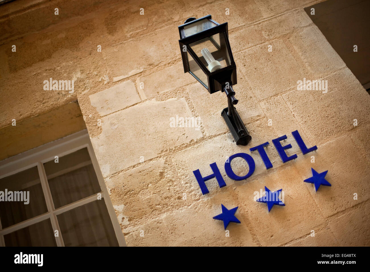 Facade of a three stars hotel Stock Photo - Alamy