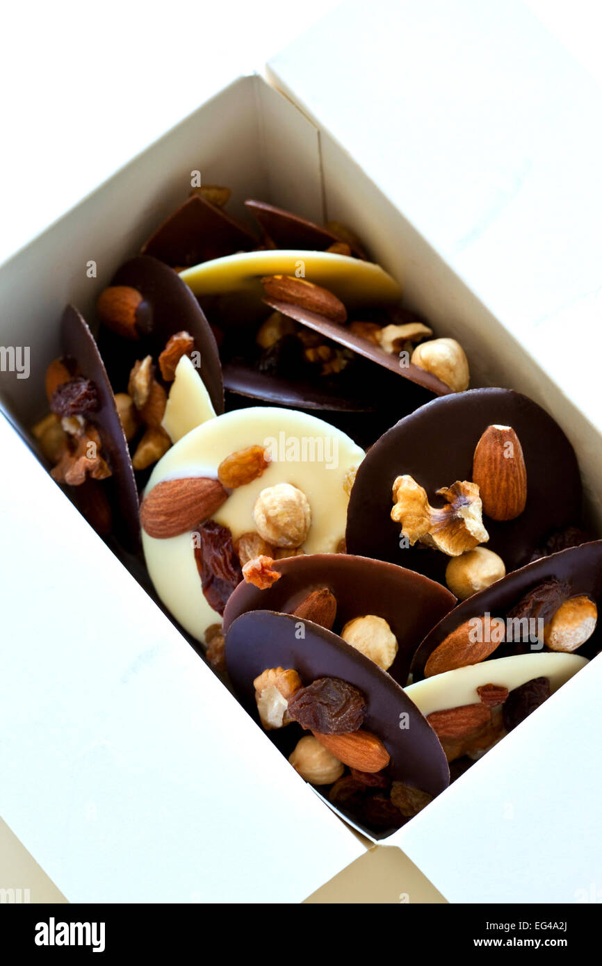 Chocolate candies in a box Stock Photo - Alamy