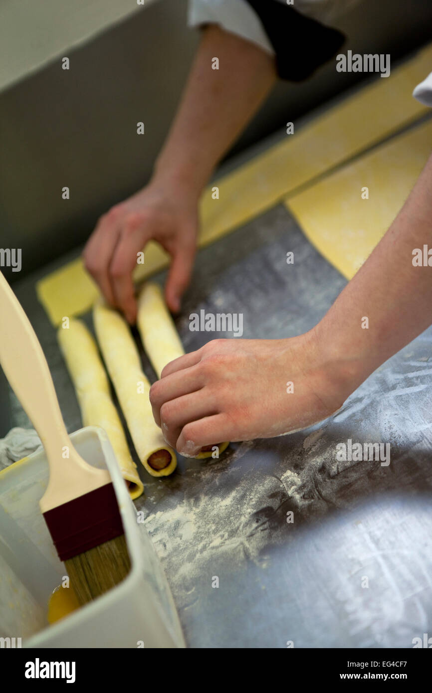 Chef making pastries in a bakery Stock Photo - Alamy