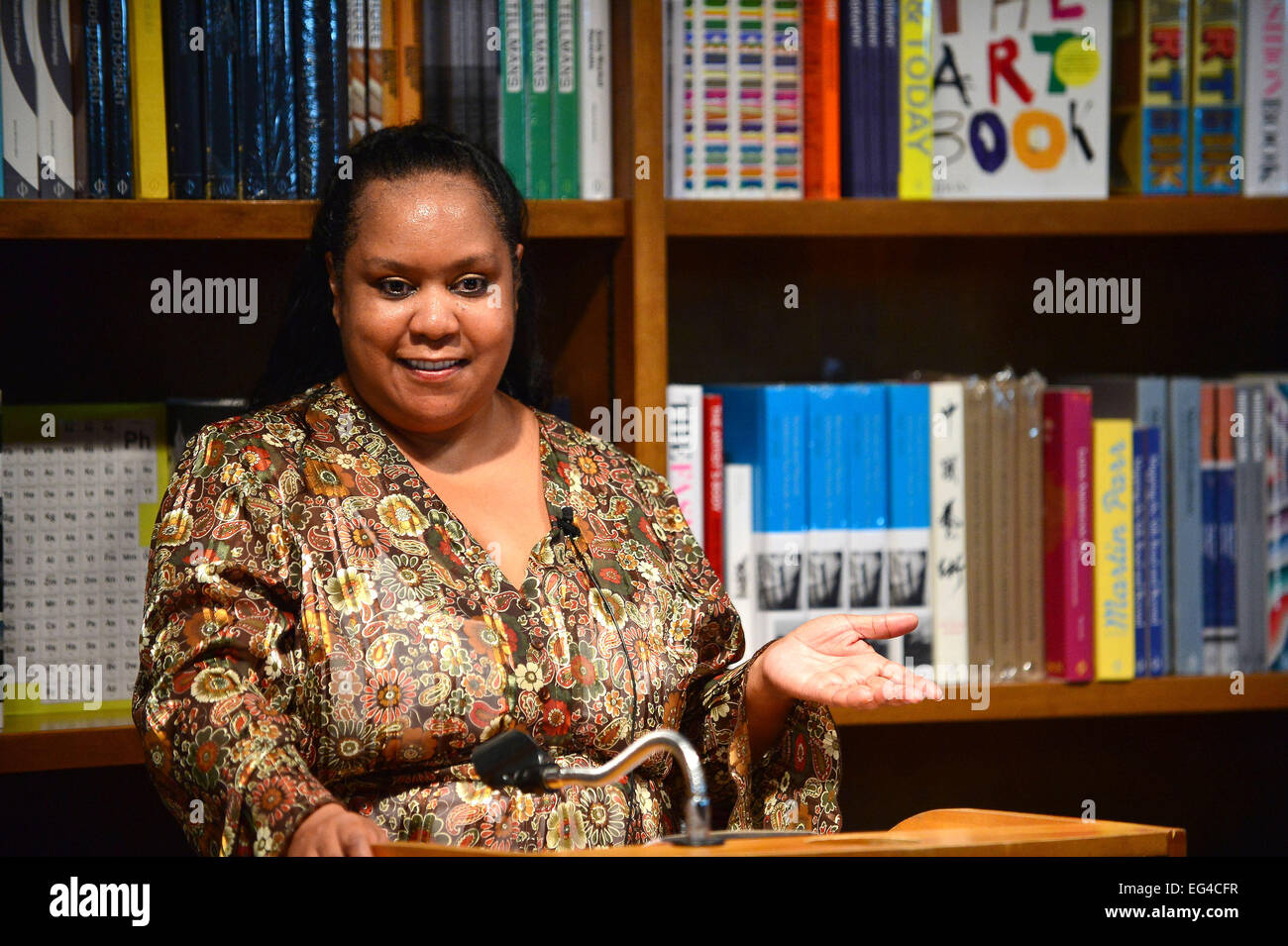 Author Zane signs copies of her book entitled 'The Other Side of the ...