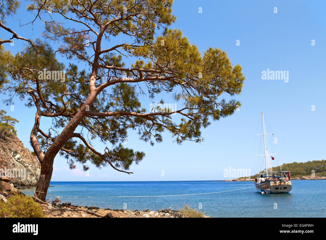 ship in blue bay Stock Photo - Alamy