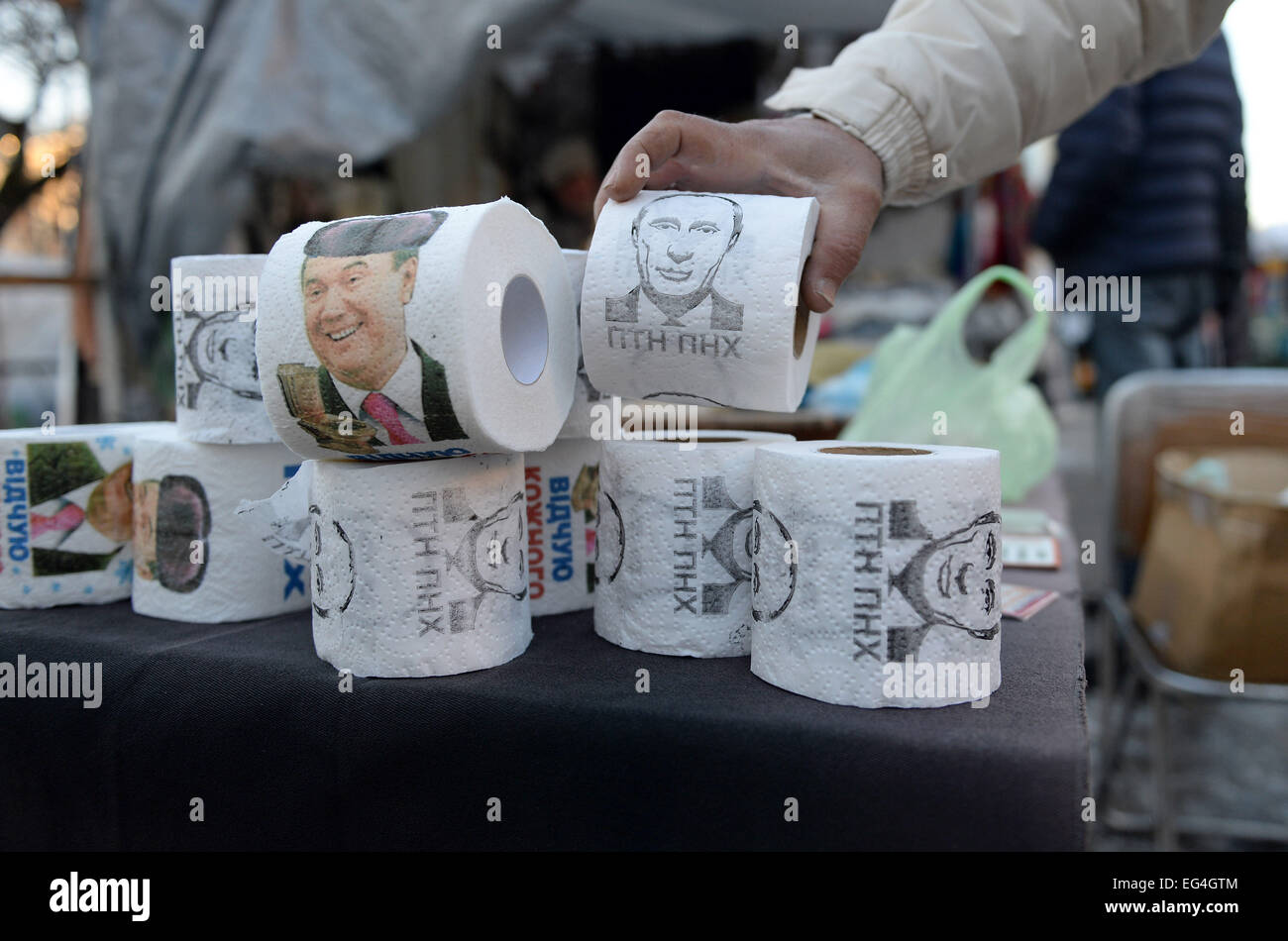 Lviv, Ukraine. 16th February, 2015. A street vendor sells toilet paper ...