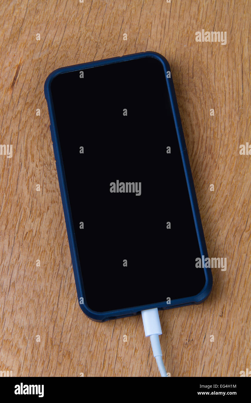 Apple iPhone recharging Stock Photo - Alamy