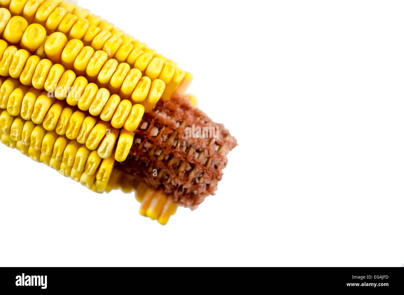 Partially crumbled yellow corn isolated on white Stock Photo - Alamy