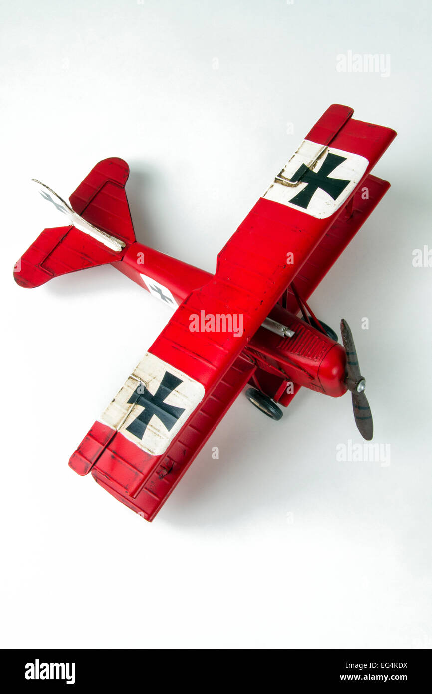Hand crafted model of a German World War One biplane against a plain ...