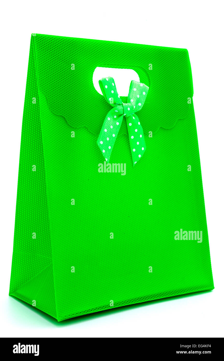 Green gift bag on a white background Stock Photo - Alamy