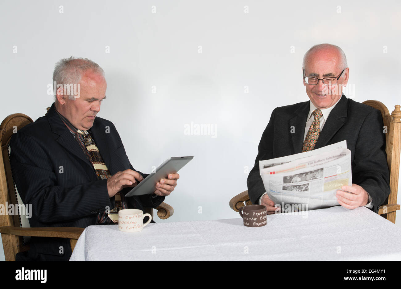 Two men reading paper hi-res stock photography and images - Alamy