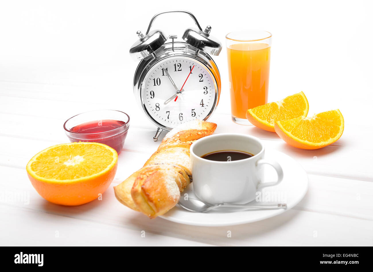 Breakfast and alarm clock Stock Photo - Alamy