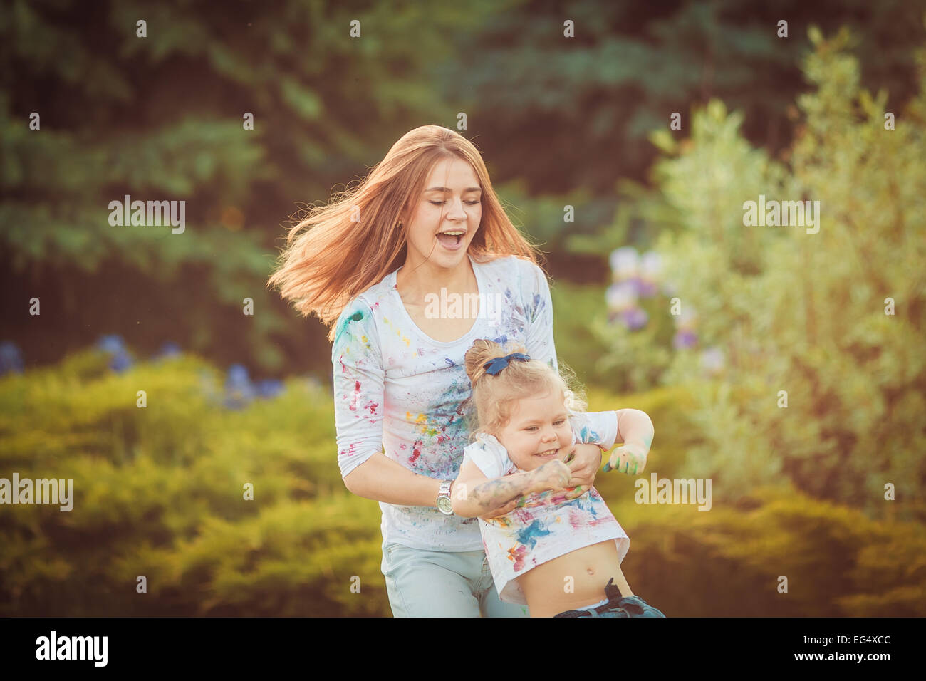 Mother and little daughter playing togethe Stock Photo - Alamy