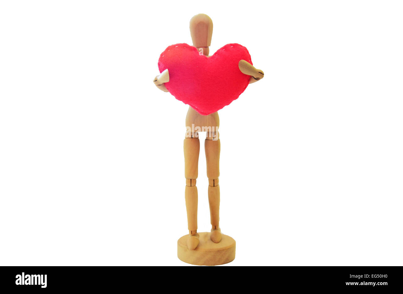 Human wooden figure with Handmade Heart model made from velvet Stock ...