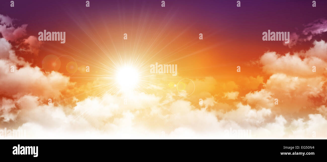 Panoramic sunset. The setting sun breaking through white clouds. High ...