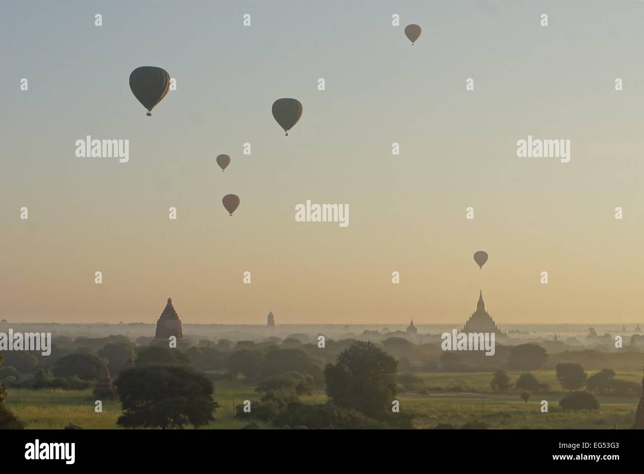 Balloons flying over Buddhist pagodas at Bagan's ancient temples in ...