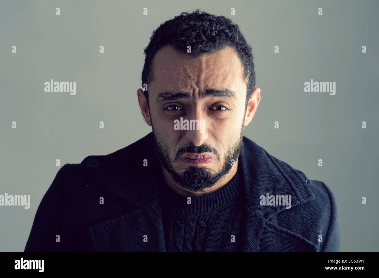 Man with sad expression Stock Photo - Alamy