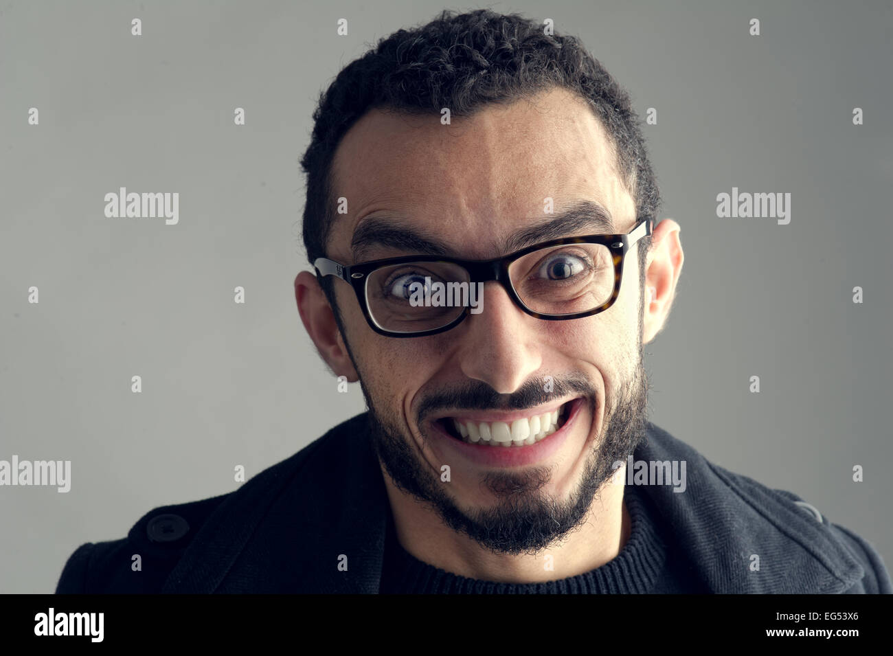 Funny Businessman with Crazy Expression isolated on Grey background ...