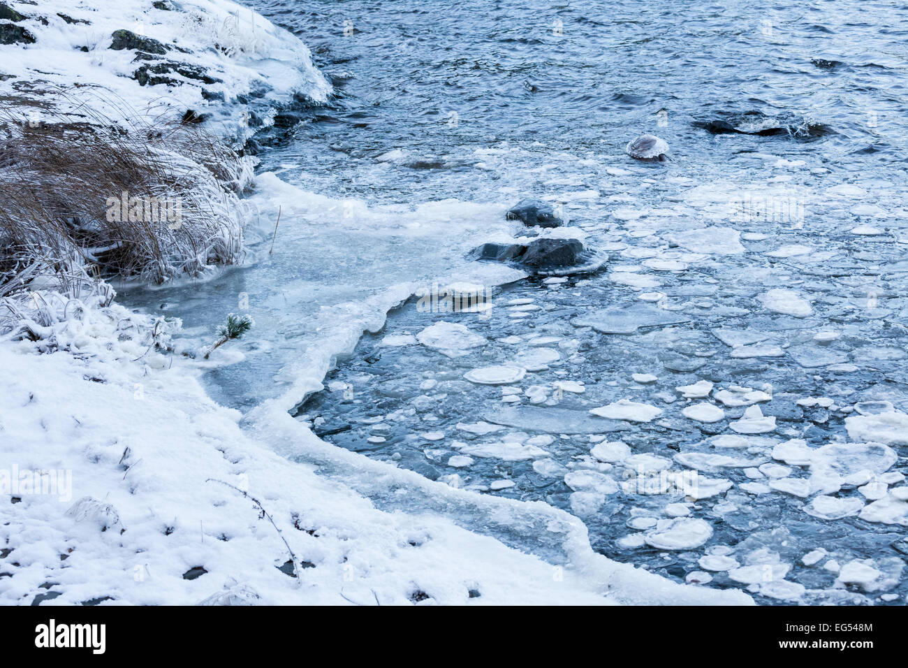 Ice pieces in a lake Stock Photo - Alamy