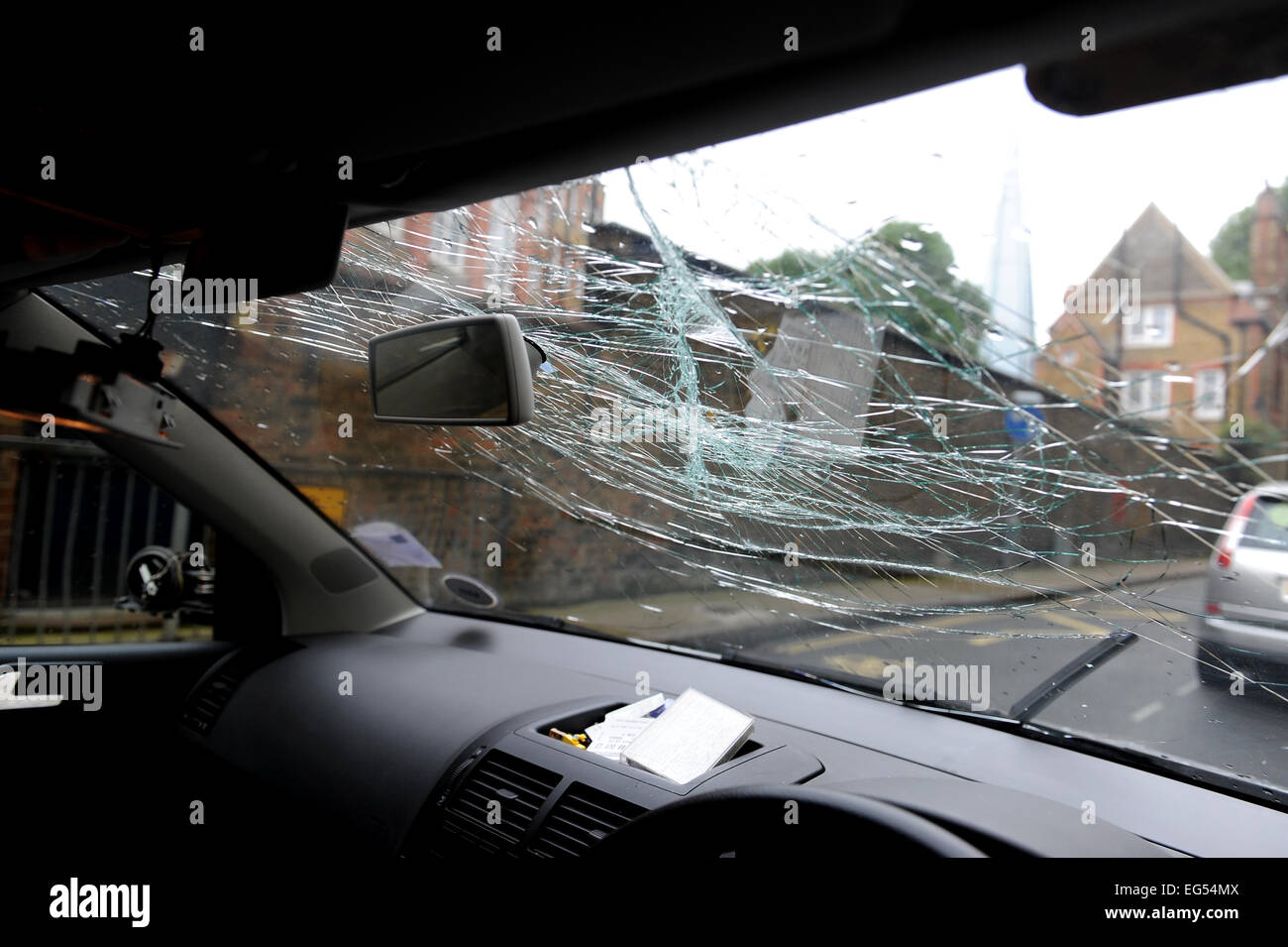 Smashed windscreen in volkswagen polo car Stock Photo - Alamy