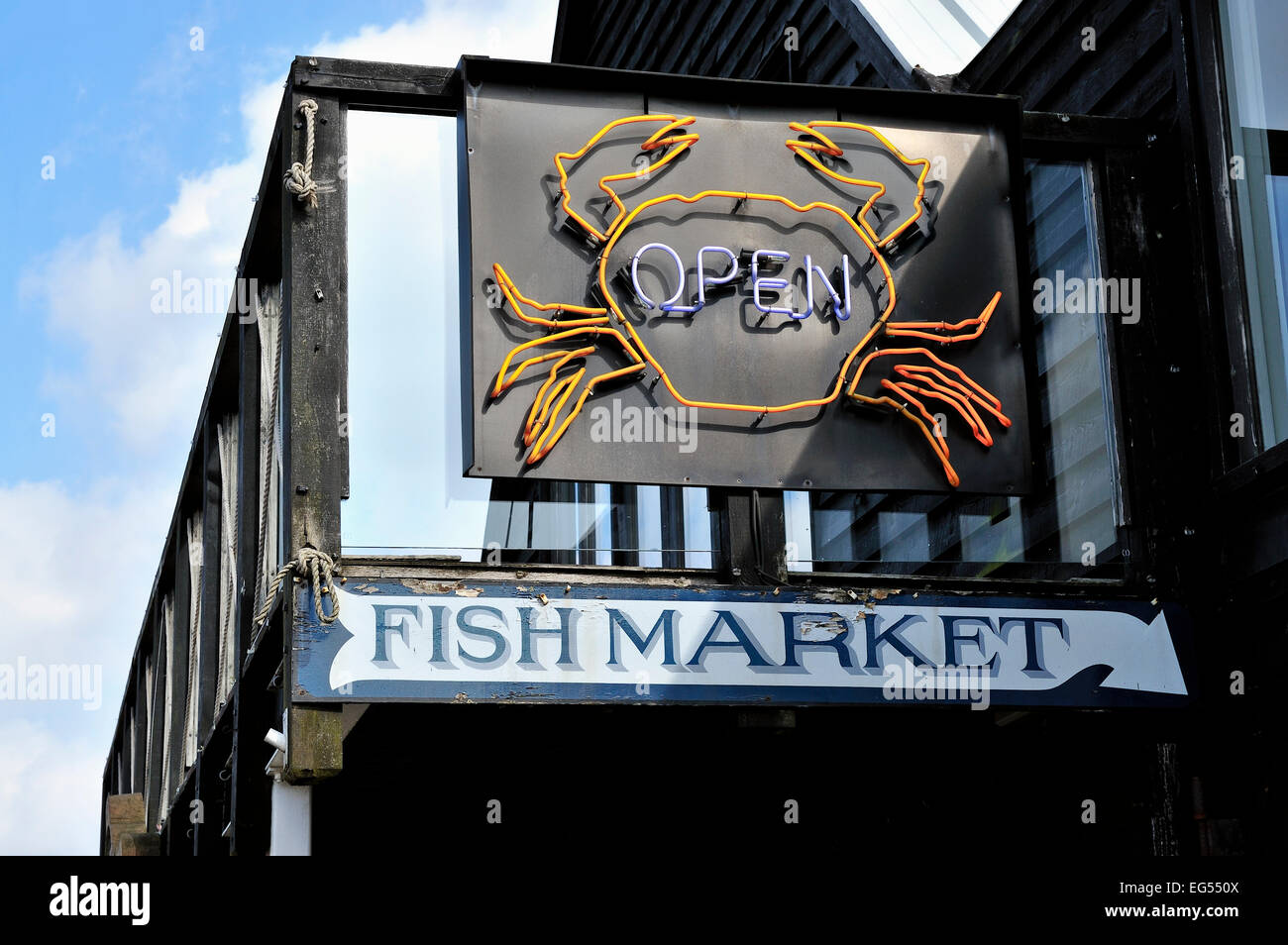 neon sign advertising a fish market whitstable harbour kent Stock Photo ...