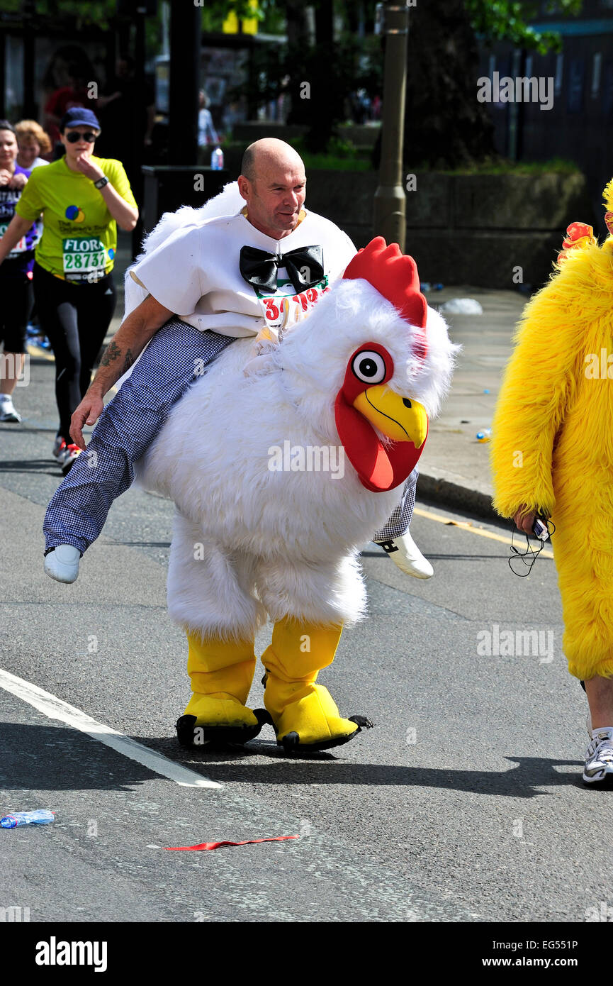 charity runner dressed in chicken costume taking part in the London ...