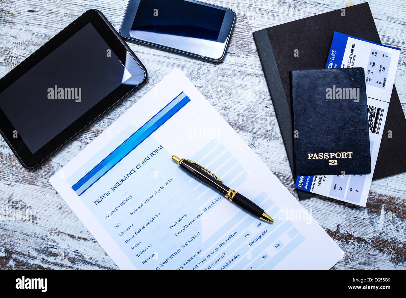Travel insurance application form with a boarding pass and a passport ...