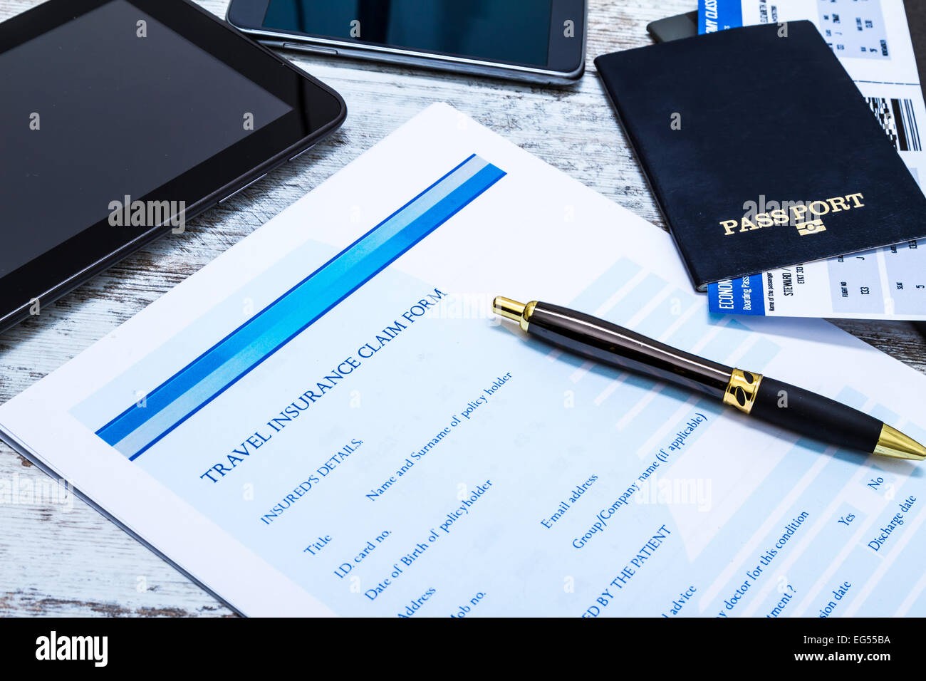 Travel insurance application form with a boarding pass and a passport ...
