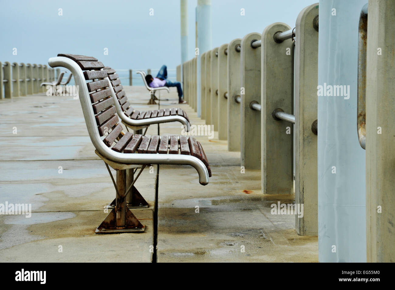 Weathered stainless steel benches on New Pier Durban beachfront South ...