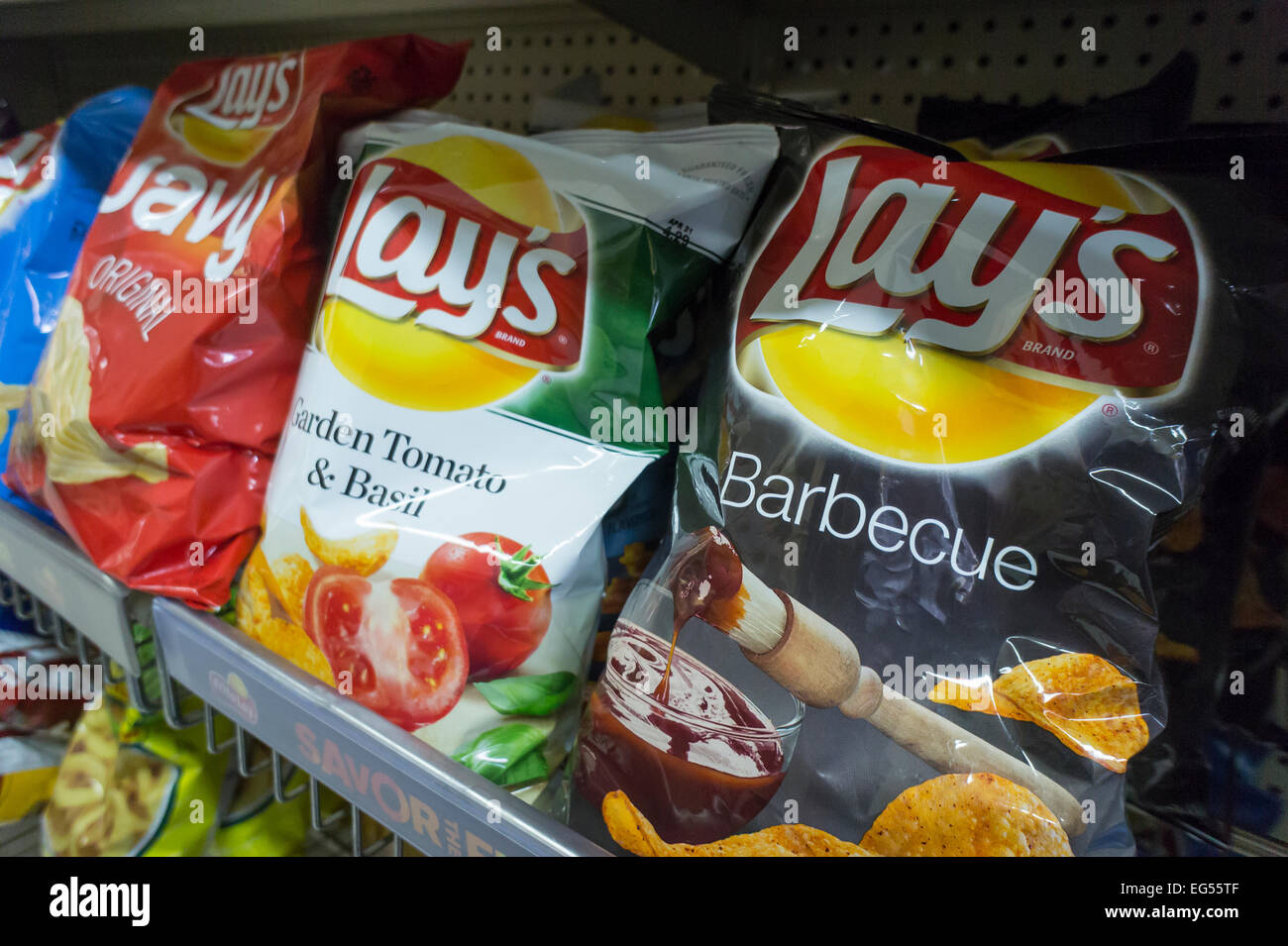 A display of PepsiCo Frito-Lay potato chip snacks in a supermarket in ...