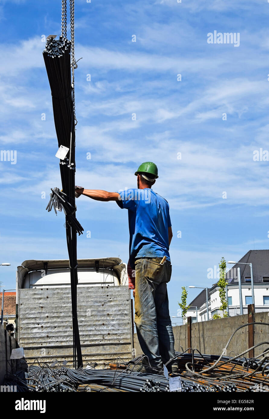 Man is working at the construction site Stock Photo - Alamy