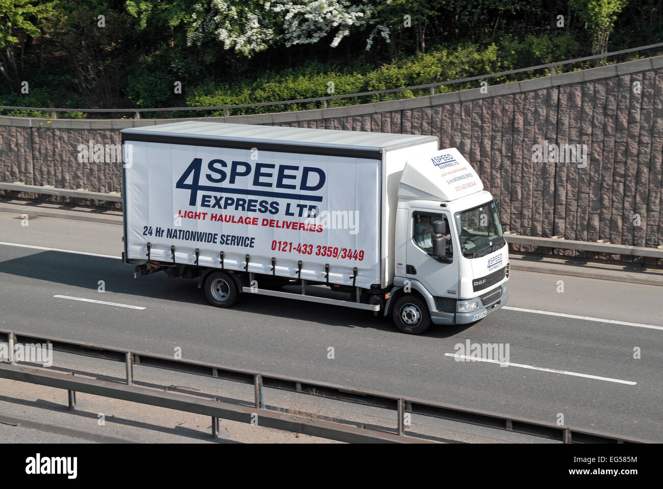 A 4 Speed Express Ltd light haulage truck on the A40 in West London, UK ...