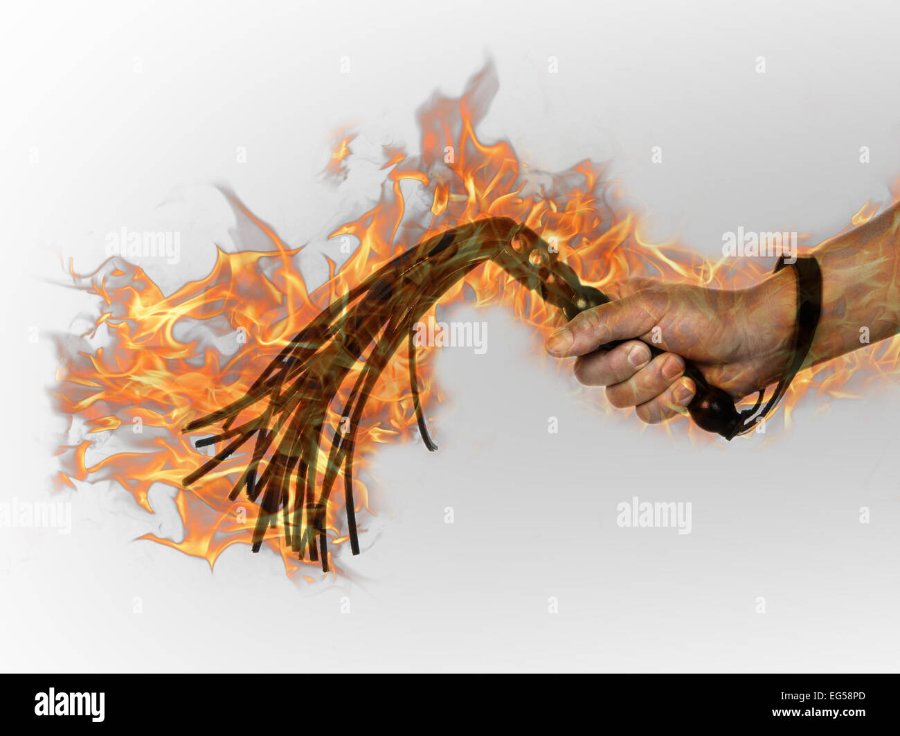 Black leather flogging whip in the hands of a ghost - orange Stock ...