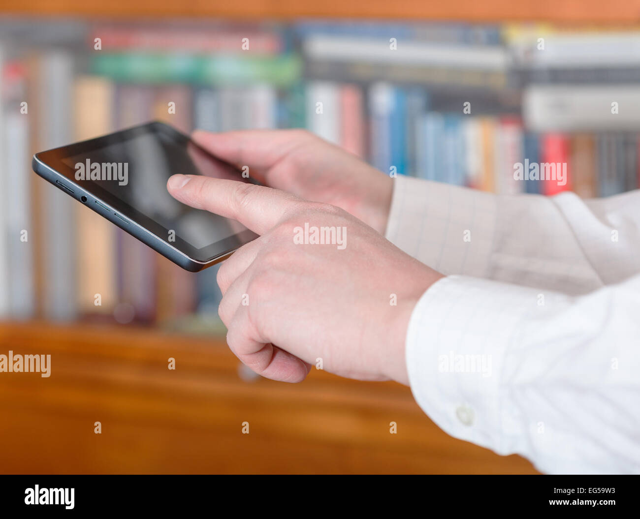 businessman finger pressing tablet pc screen in office room Stock Photo ...