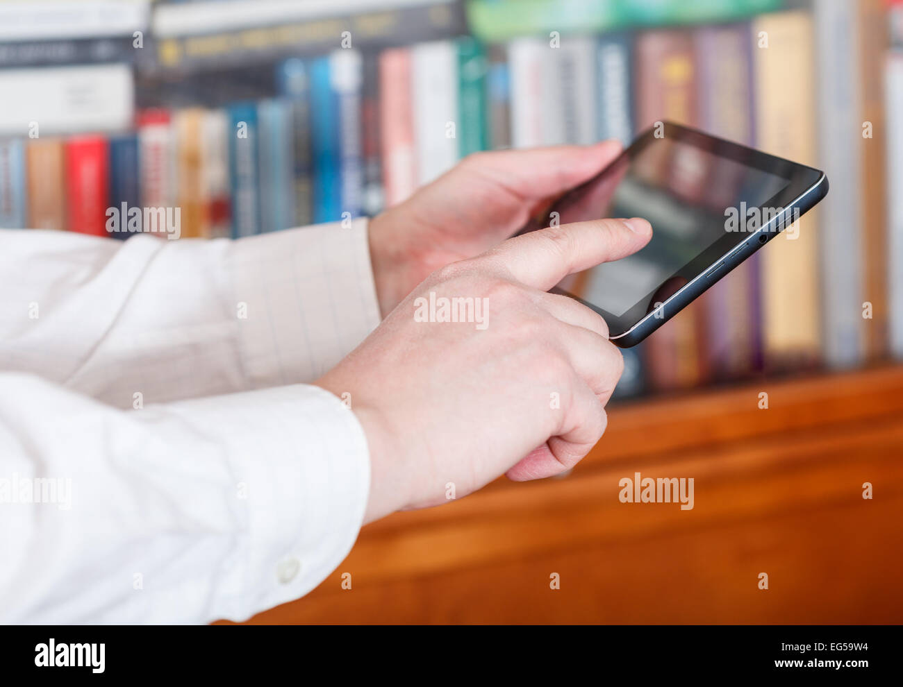 businessman finger clicking tablet pc screen in office room Stock Photo ...