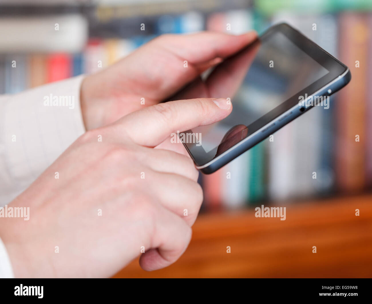 businessman touch tablet pc screen in office room Stock Photo - Alamy