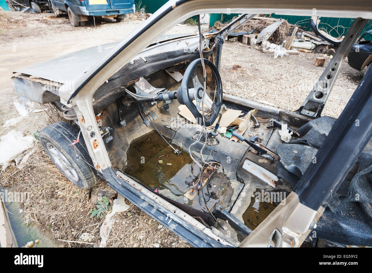 old disassembled car at an automobile country yard Stock Photo - Alamy