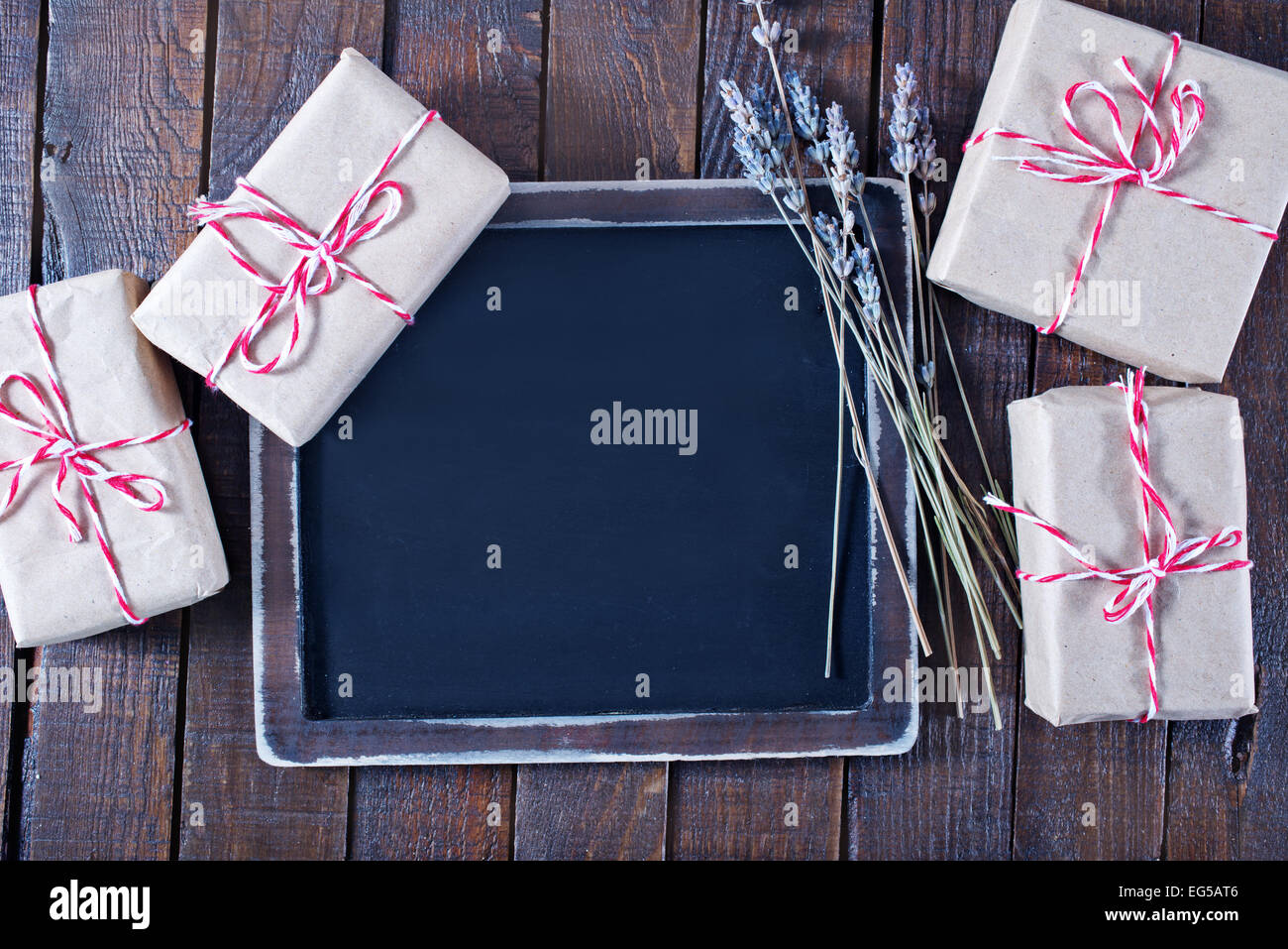 presents and black board on a table Stock Photo - Alamy