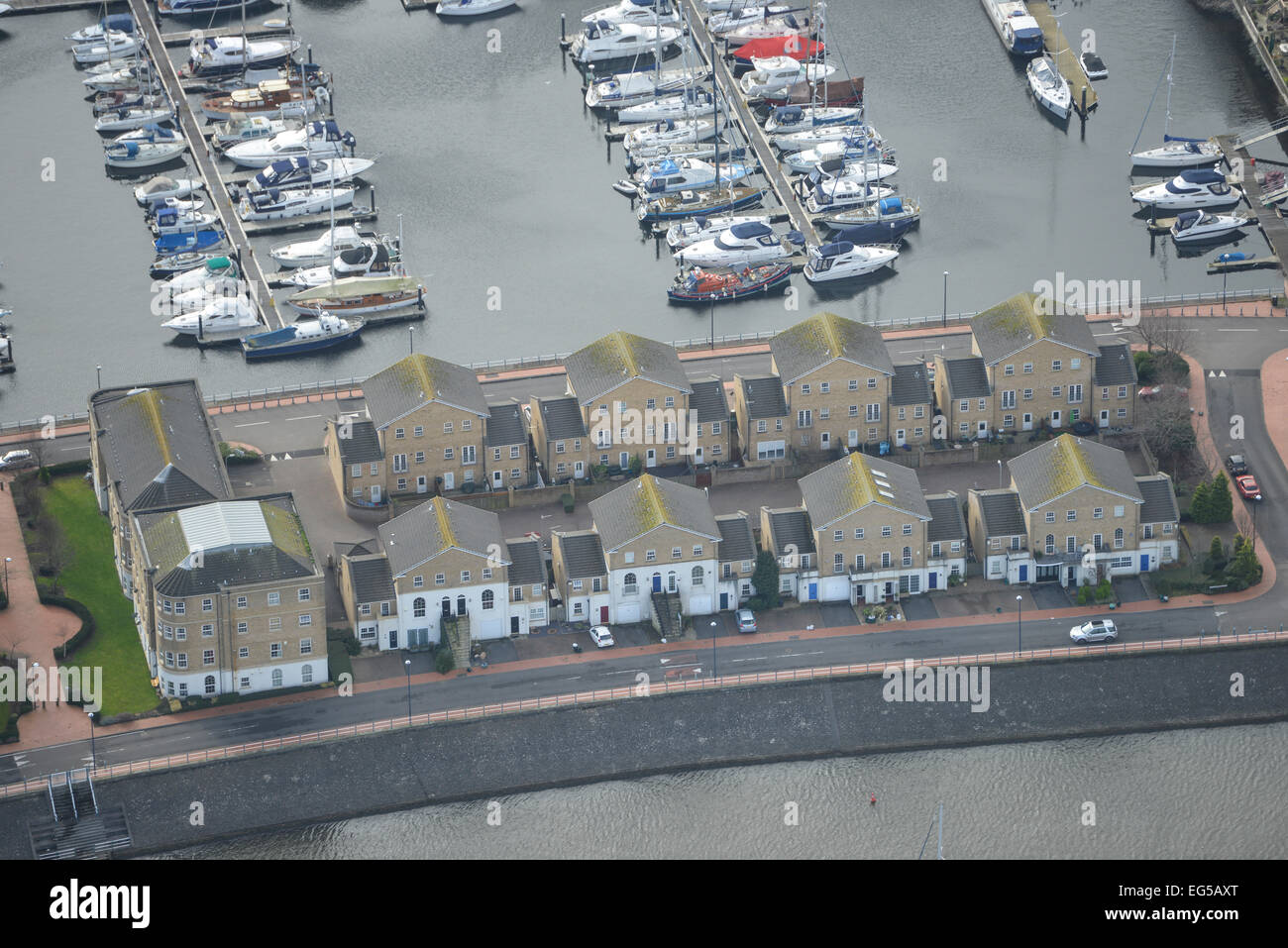An aerial view of residential development along the water side at ...