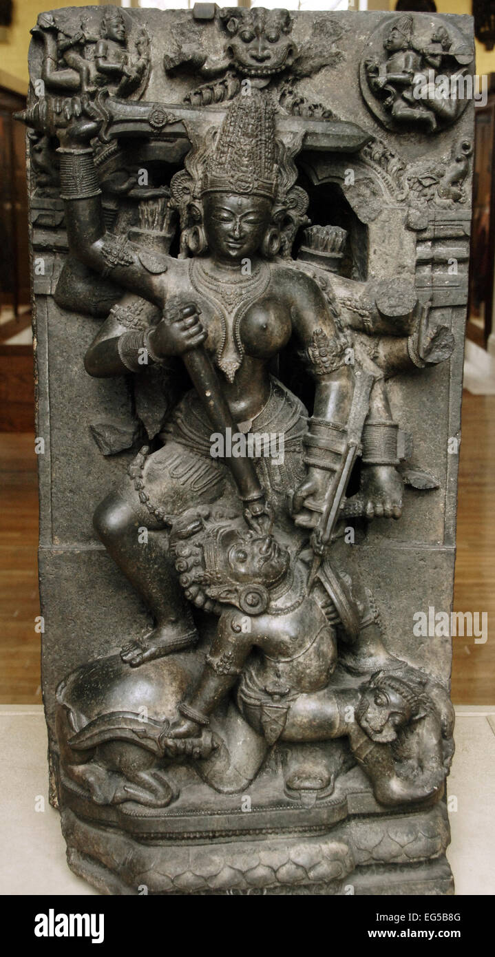 Durga killing the buffalo demon, Orissa, India. 13th century. British ...