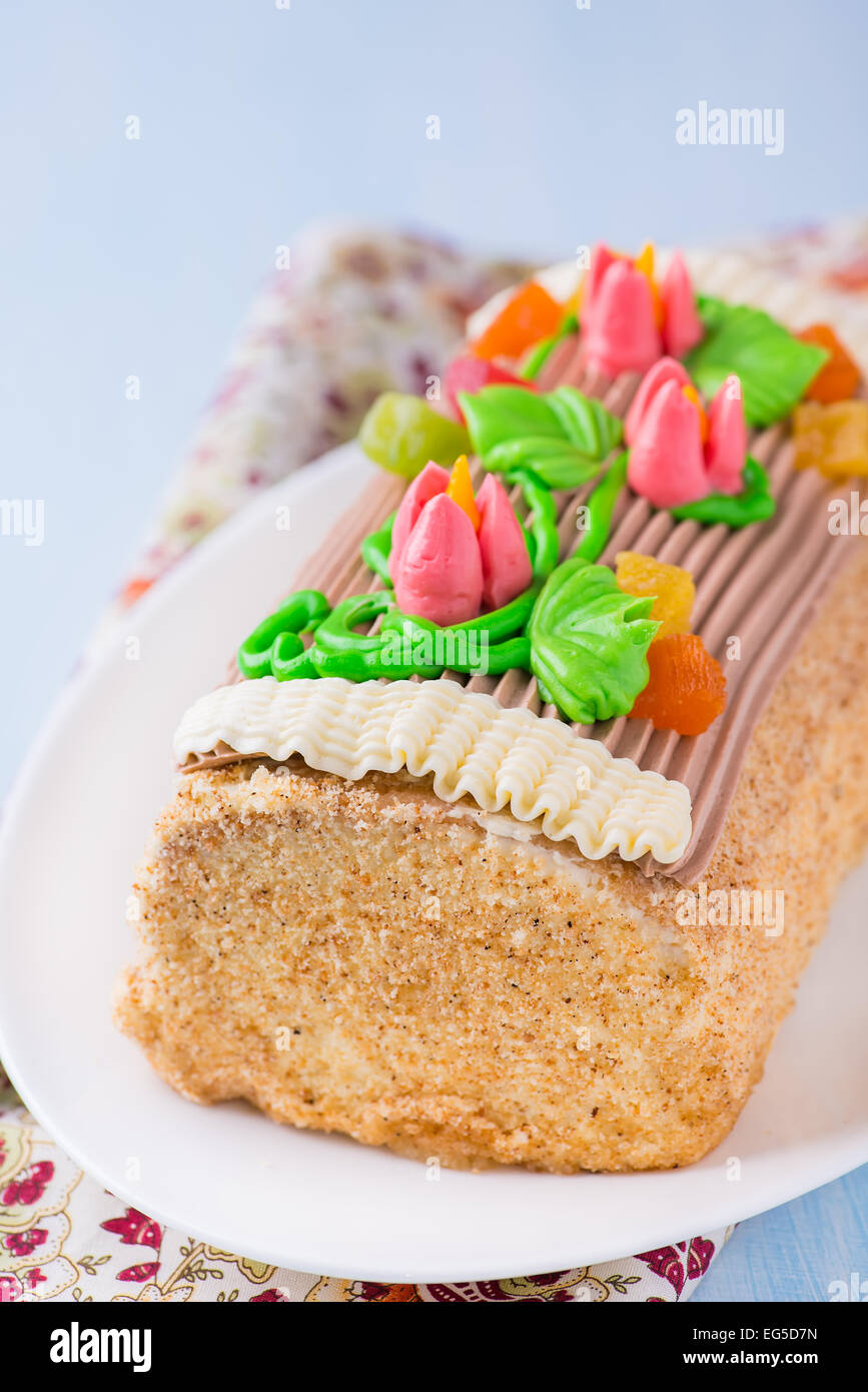 Roulade cake, decorated with colourful buttercream flowers. Yule Log ...