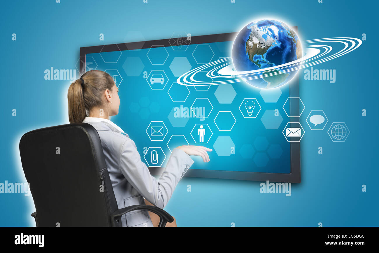 Businesswoman pressing touch screen button on virtual interface Stock ...
