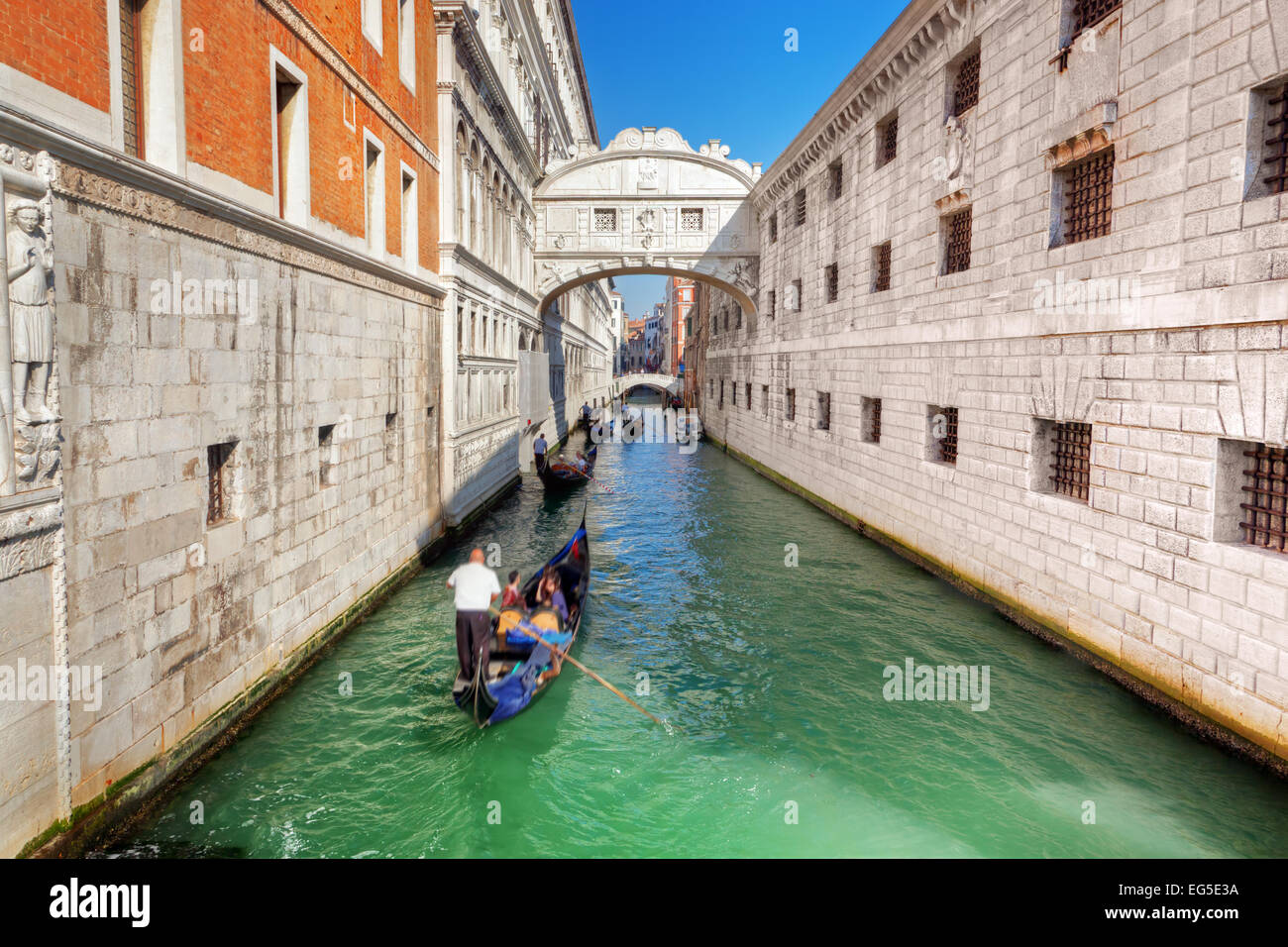 Venice Italy The Bridge Of Sighs Gondola Floats On A Canal Among Old