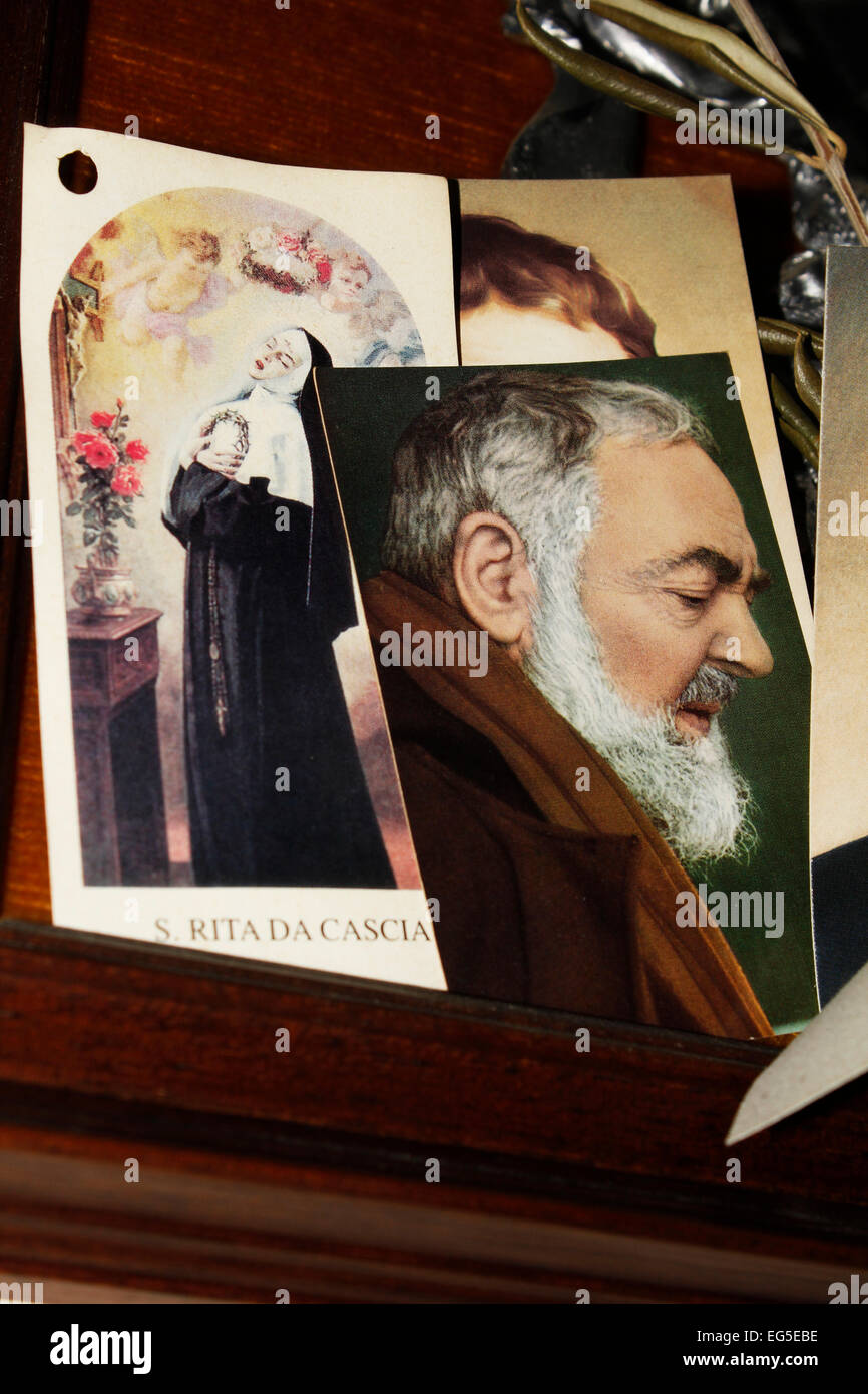 Italian postcards with pictures of saints Stock Photo - Alamy