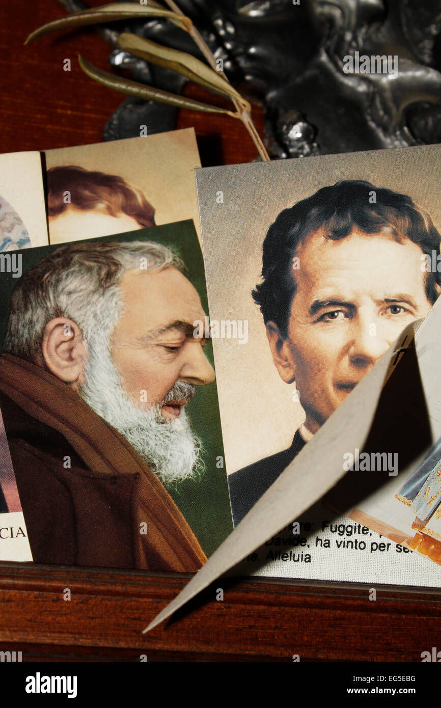 Italian postcards with pictures of saints Stock Photo - Alamy