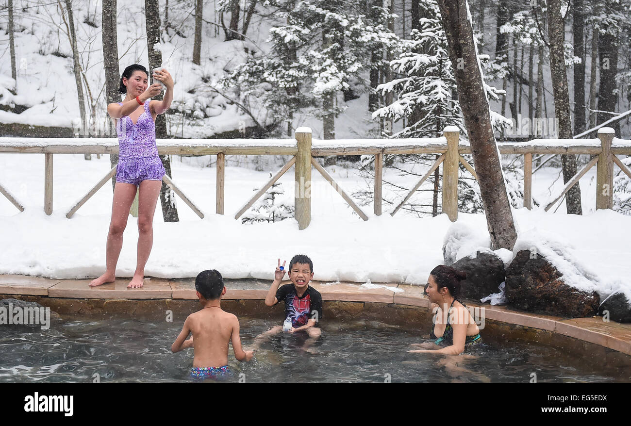 Changchun. 17th Feb, 2015. Tourists enjoy hot spring bath at Changbai ...