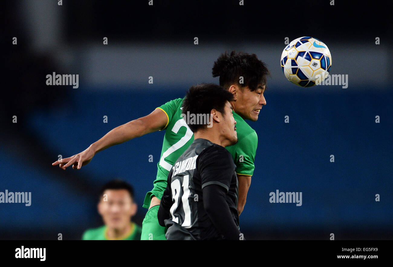 Beijing, China. 17th Feb, 2015. Zhang Chengdong (Rear) of China's ...