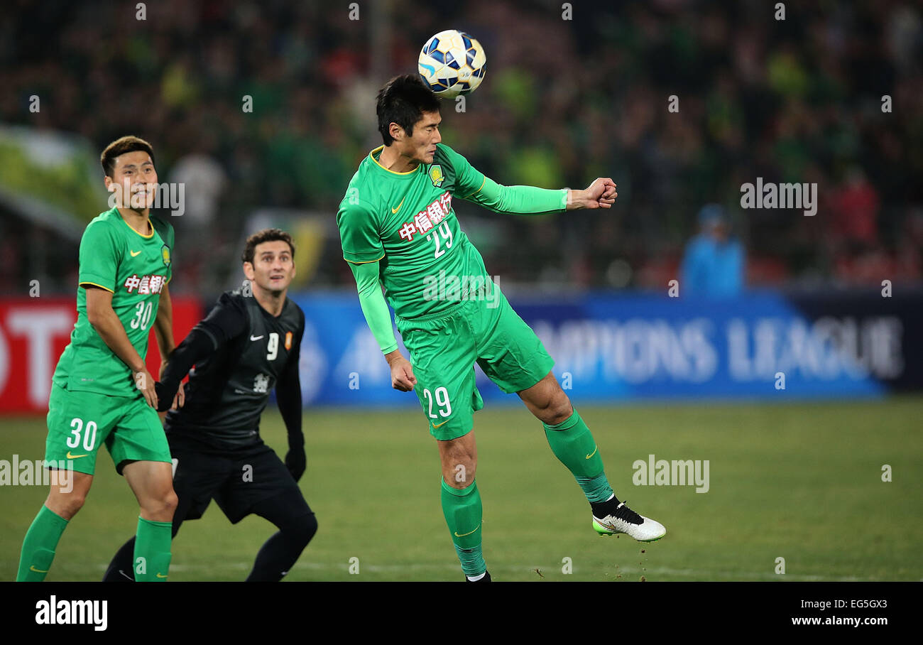 Beijing, China. 17th Feb, 2015. Shao Jiayi (R) of China's Beijing Guoan ...